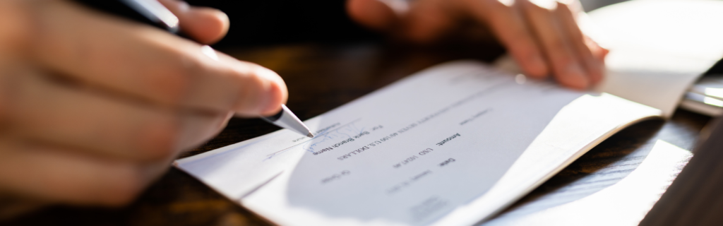 Cheques in France Explained: Rules, Uses & Risks for Expats